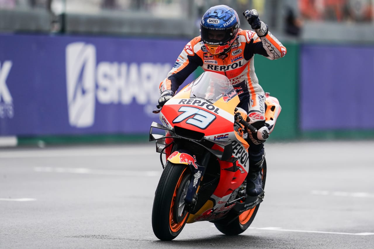 Storm the field! Alex Marquez conquers the wet for debut MotoGP podium ...